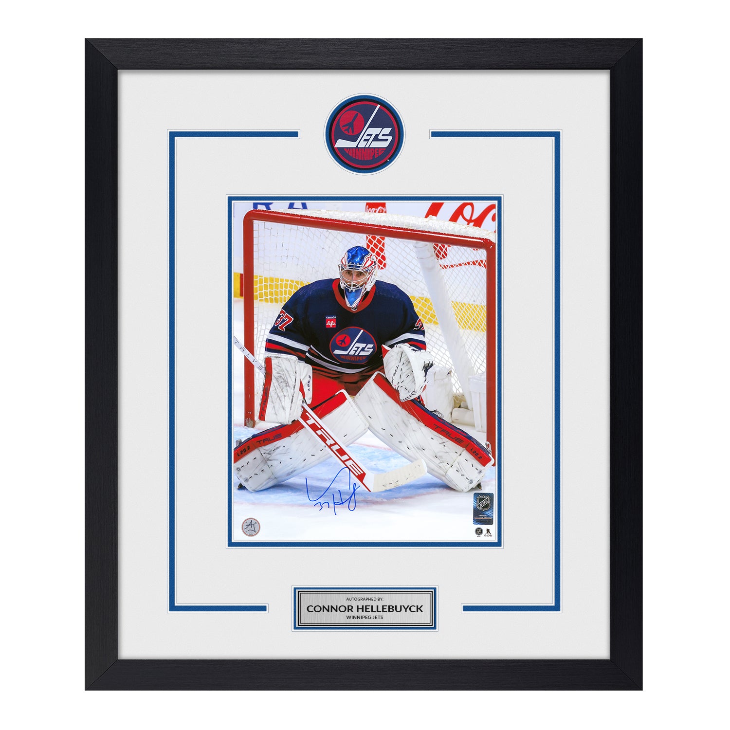 AJ Sports | Connor Hellebuyck Signed Winnipeg Jets Heritage Puck Logo ...
